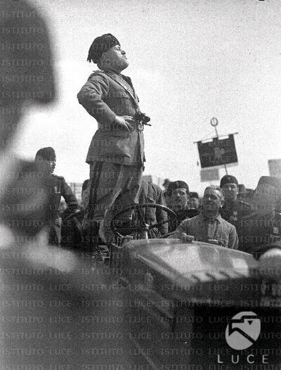 Aprilia Mussolini (in uniform of chief of the militia) gives a speech ...