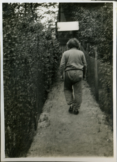 Albert Einstein walking through garden Portraits Men | Europeana